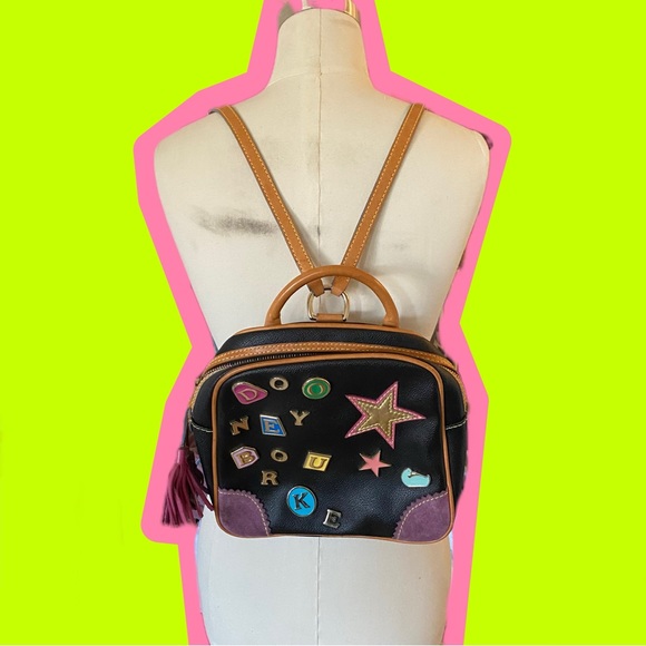 Dooney & Bourke | Bags | Dooney Bourke Charm Squad Backpack Black ...
